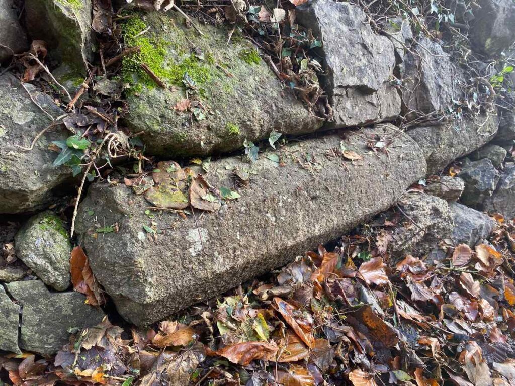 Holne Worked Octagonal Rock in Wall | Dartefacts